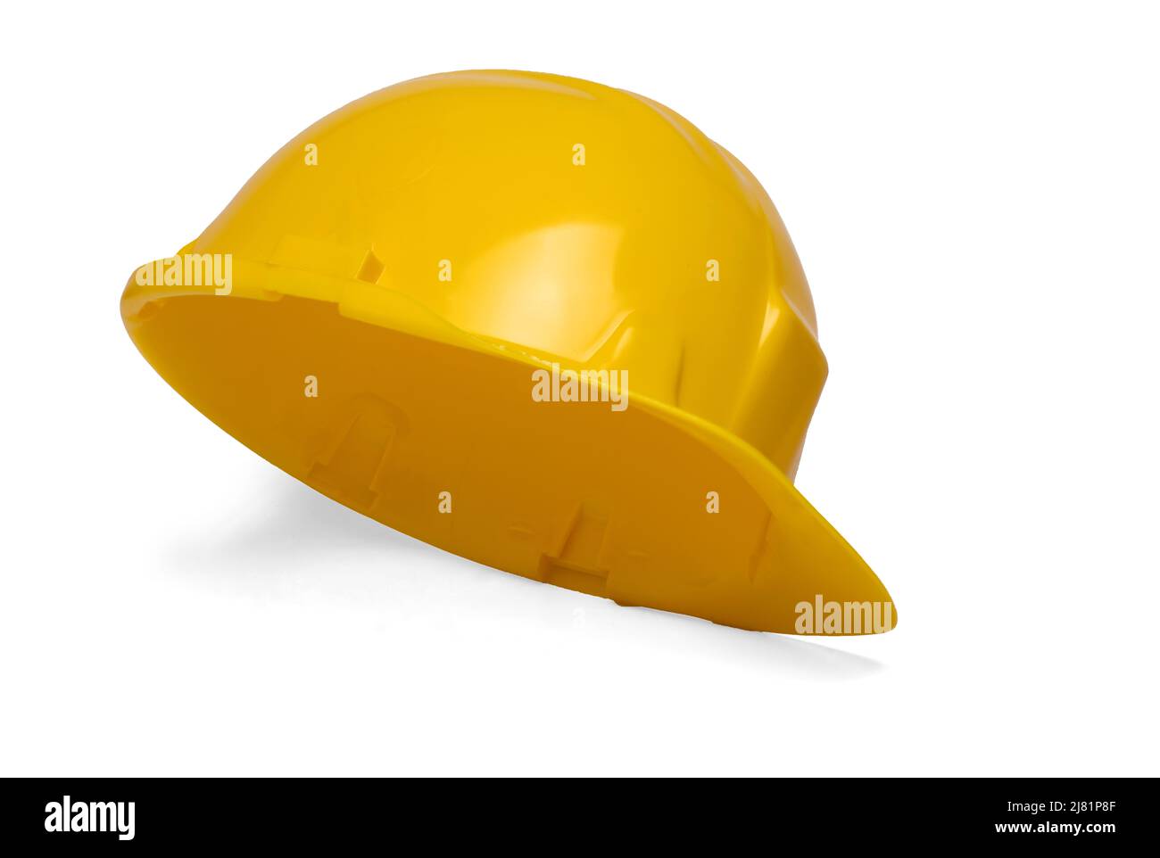Close up of a working helm construction site hardhat helmet in yellow ...
