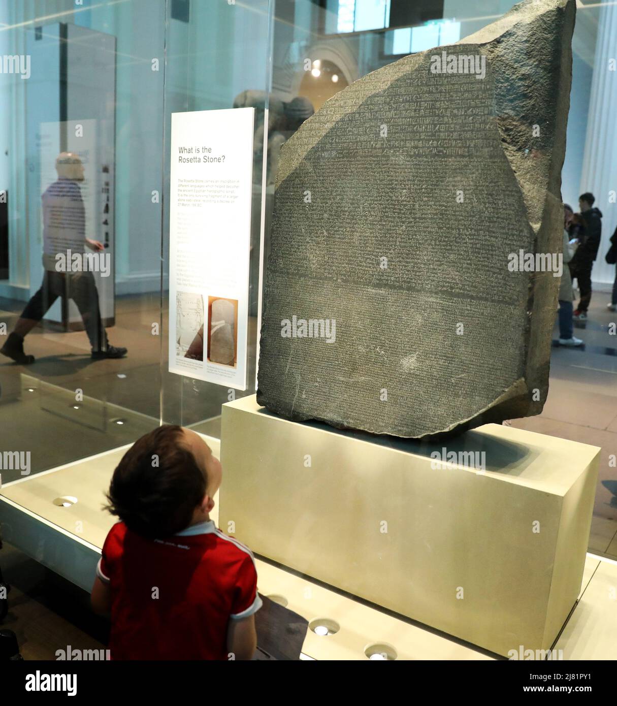 London, Britain. 11th May, 2022. A boy watches the Rosetta Stone in the ...