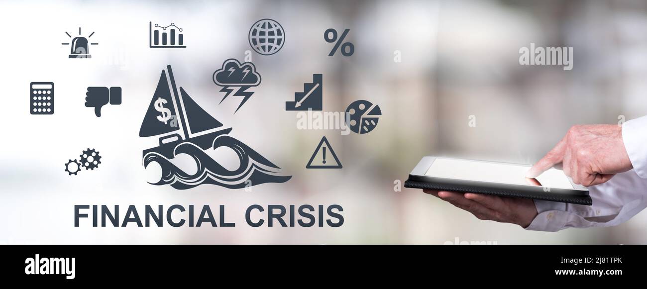 Man using a tablet with financial crisis concept Stock Photo - Alamy