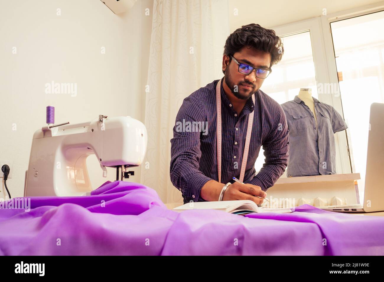 Indian tailor hi-res stock photography and images - Alamy
