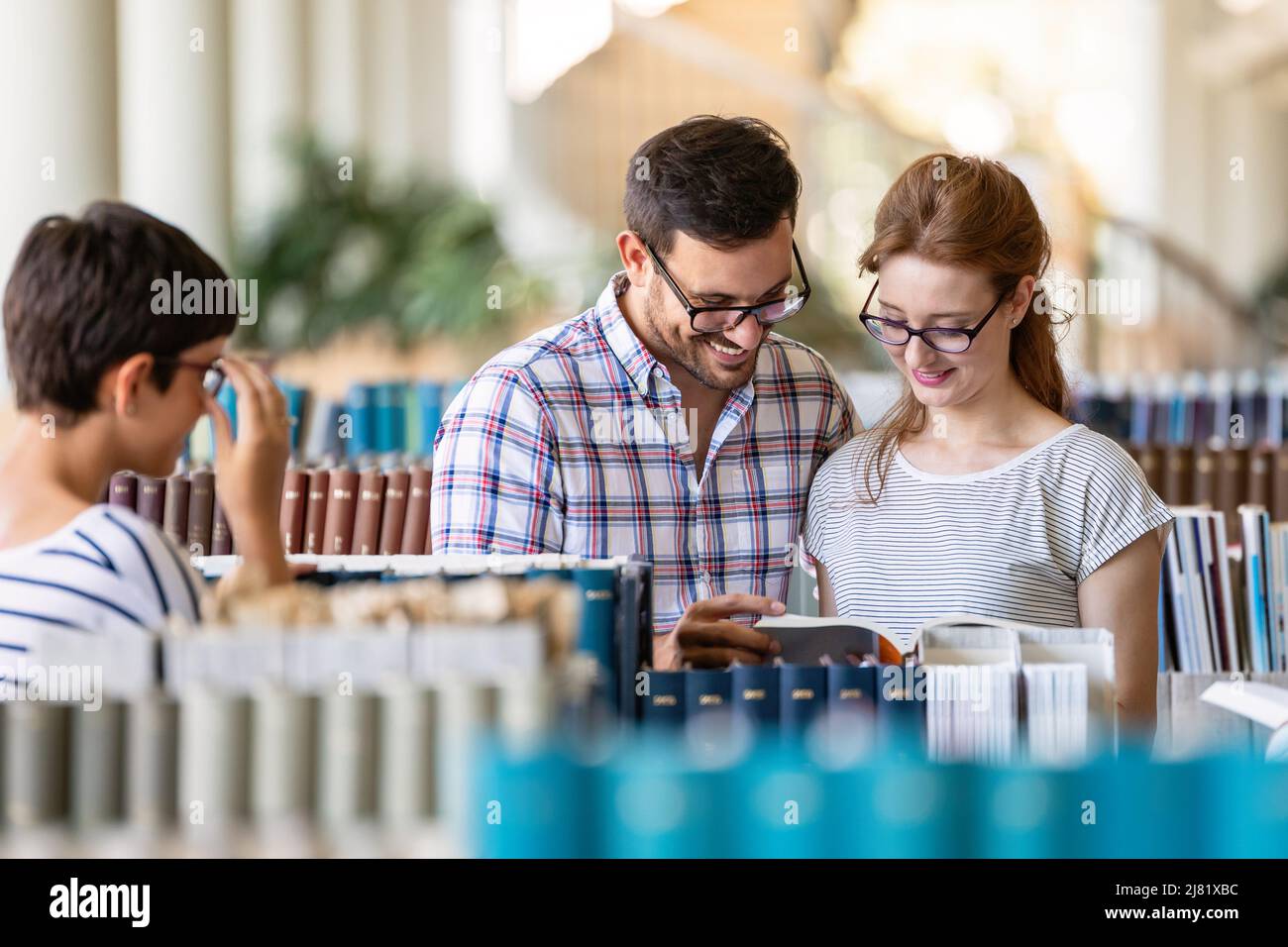 Happy group of success students studying and working together in a ...