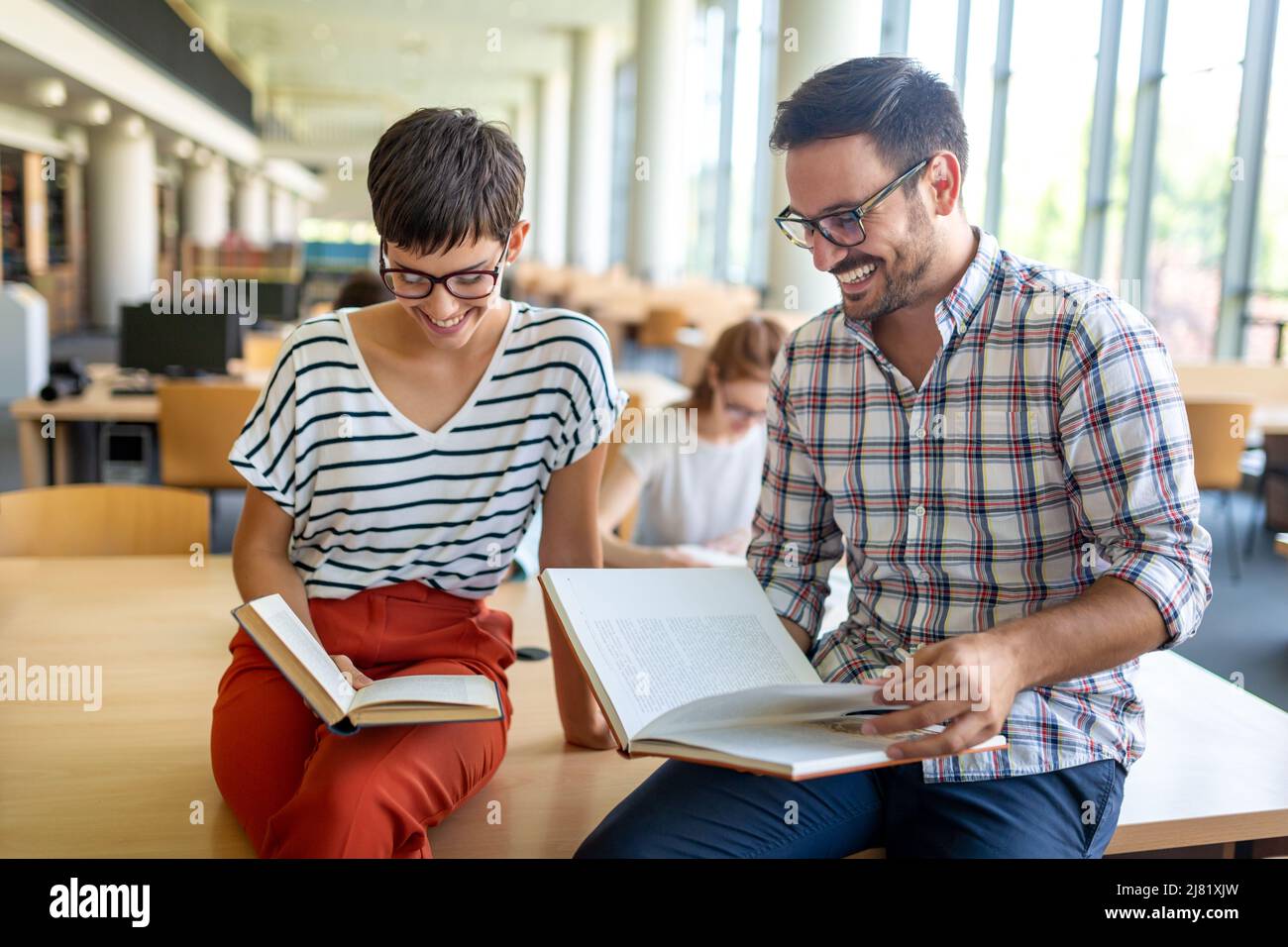 Happy group of success students studying and working together in a ...