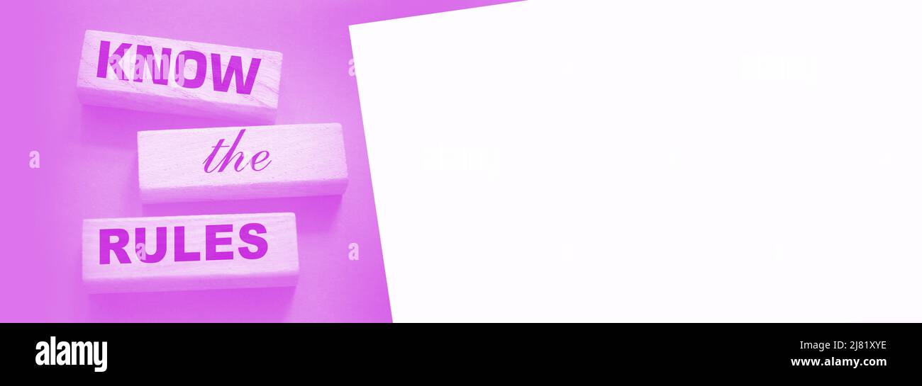 Know the rules word on wooden blocks isolated on dark grey background ...