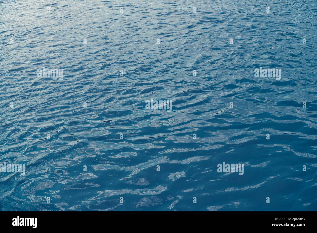 Calm ripple on water surface. River, lake, pond, sea pure blue water ...
