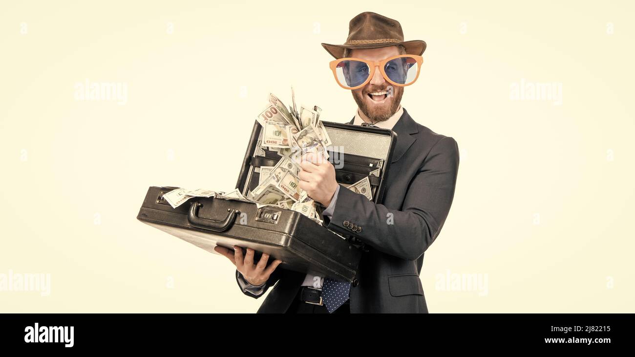 Being rich. Rich man isolated on white. Happy showman hold suitcase ...