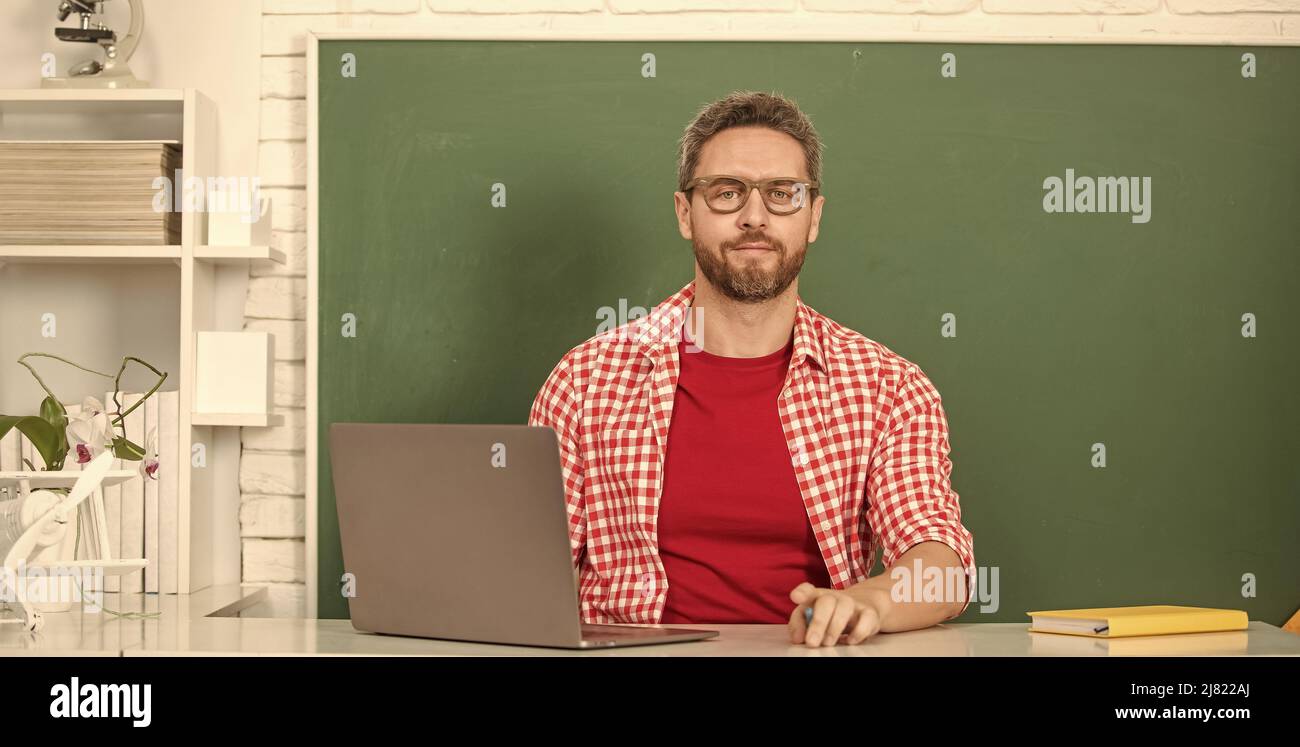 nerd student study online. private teacher in classroom with blackboard ...
