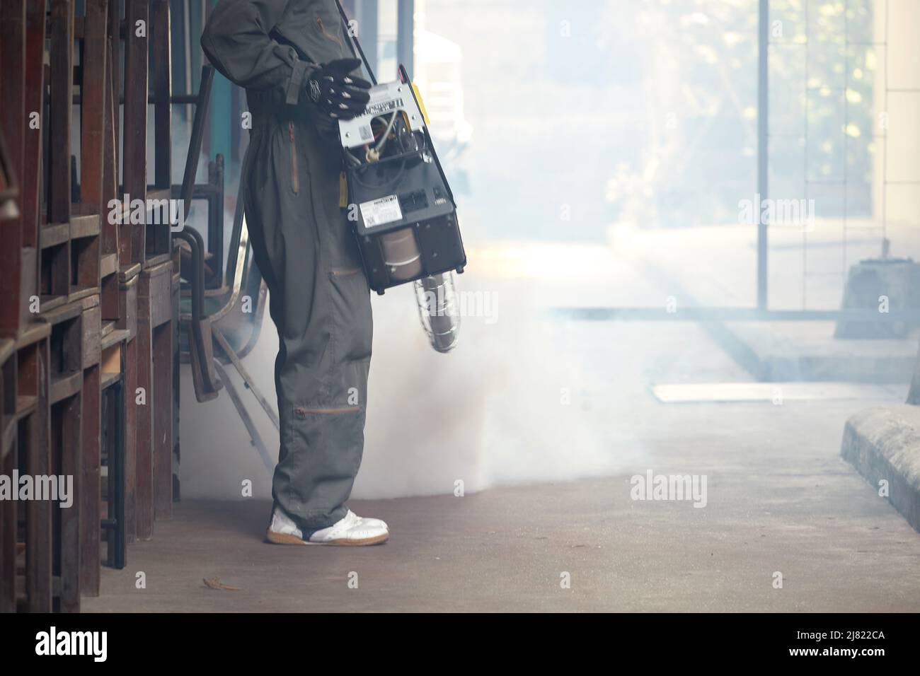 A man using fumigation mosquitoes machine for kill mosquito Stock Photo ...