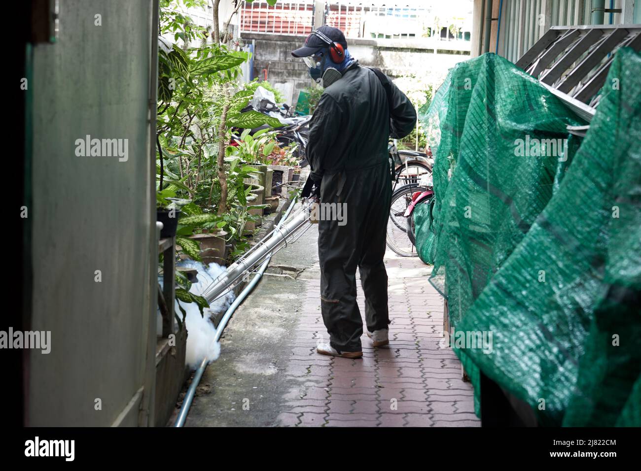 A man using fumigation mosquitoes machine for kill mosquito Stock Photo ...