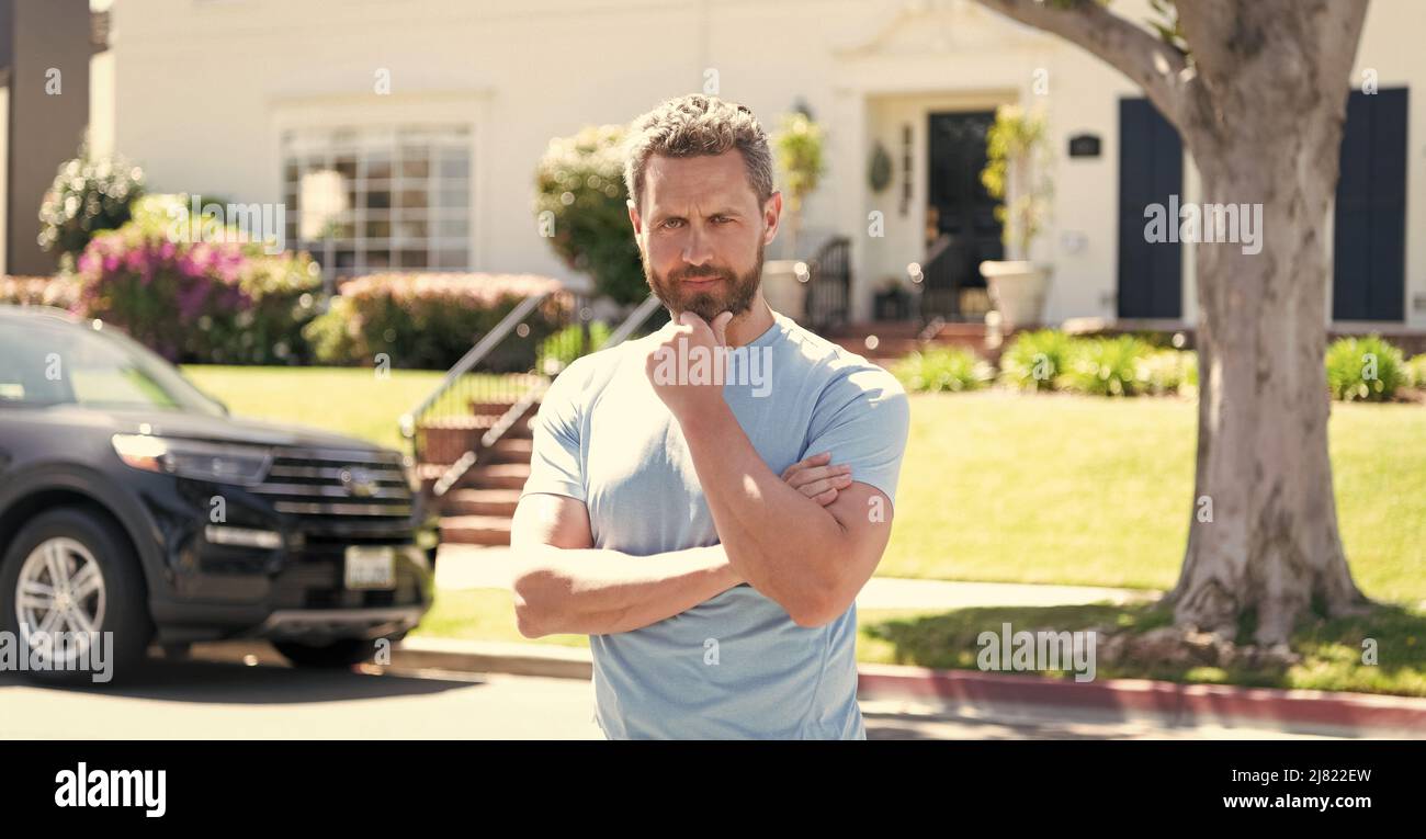 successful male model outdoor. male fashion. charismatic serious ...