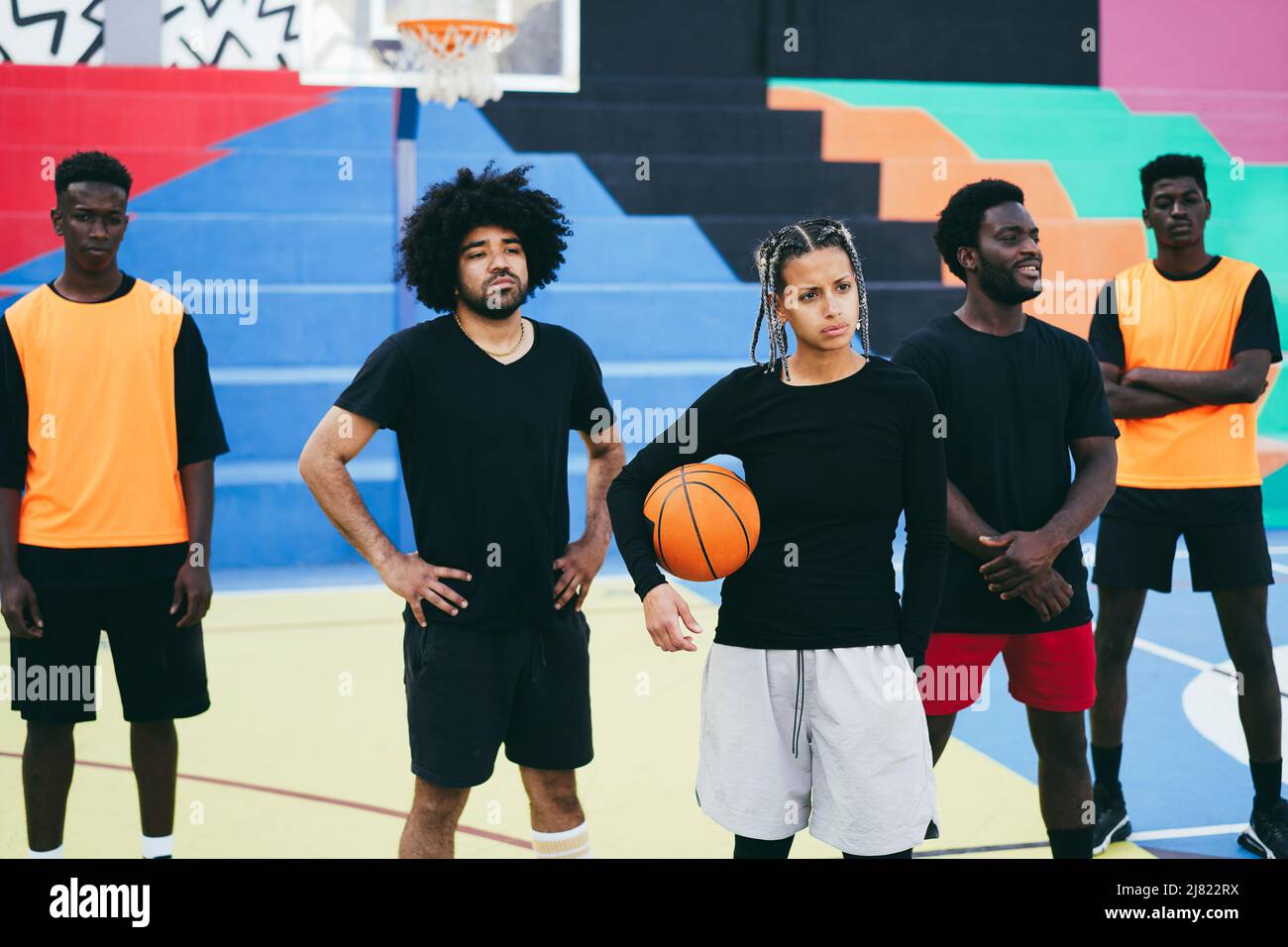 African friends playing basketball outdoor - Focus girl face Stock ...