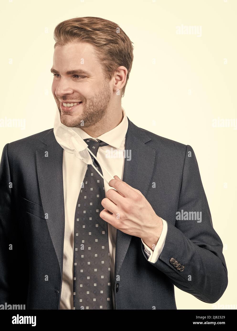 Im not afraid. Happy man take off mask. Professional man smile in ...