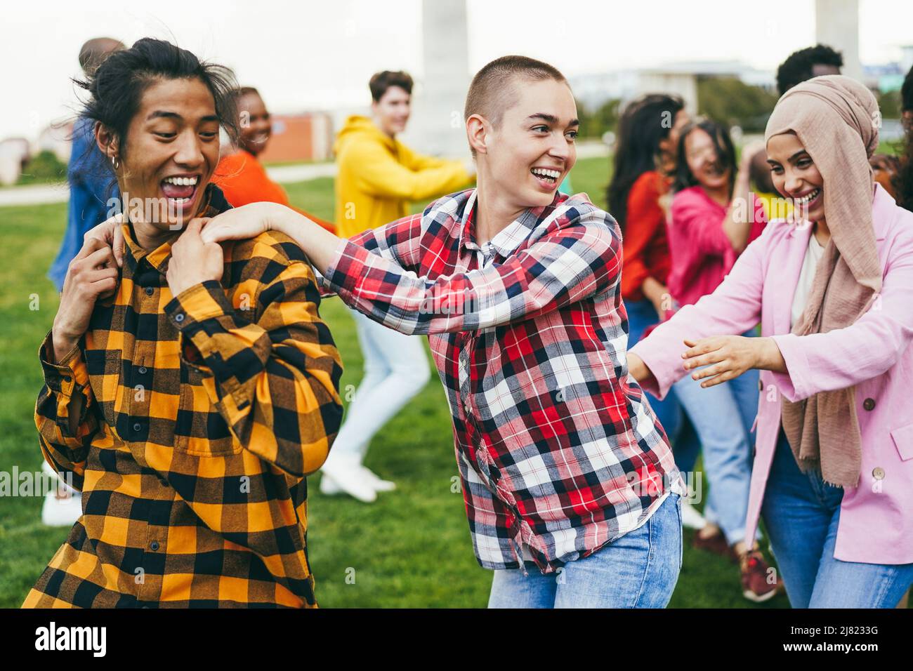 Young diverse people having fun outdoor dancing together - Soft focus ...
