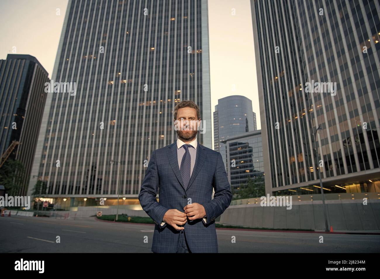 business success. successful man in businesslike suit. manager ...