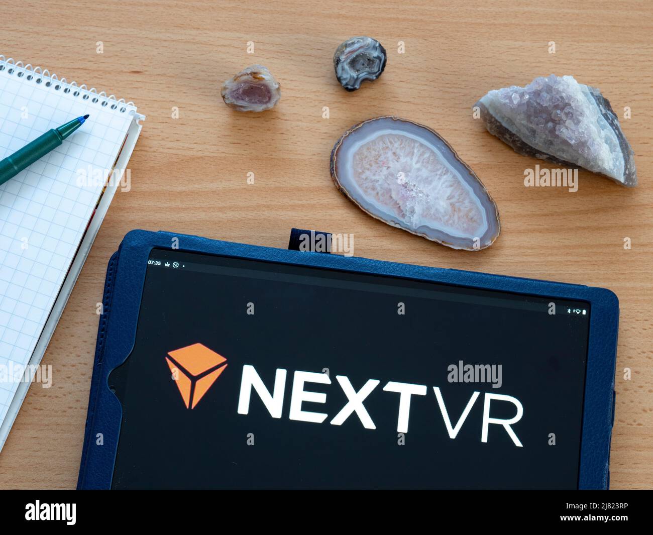 In this photo illustration NextVR, Inc. owned by Apple Inc. logo seen displayed on a tablet ...