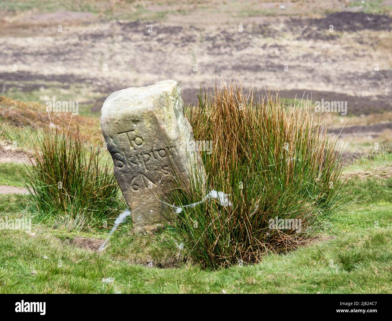 An old marker stone on the moors above Ilkley, Yorkshire, UK Stock ...
