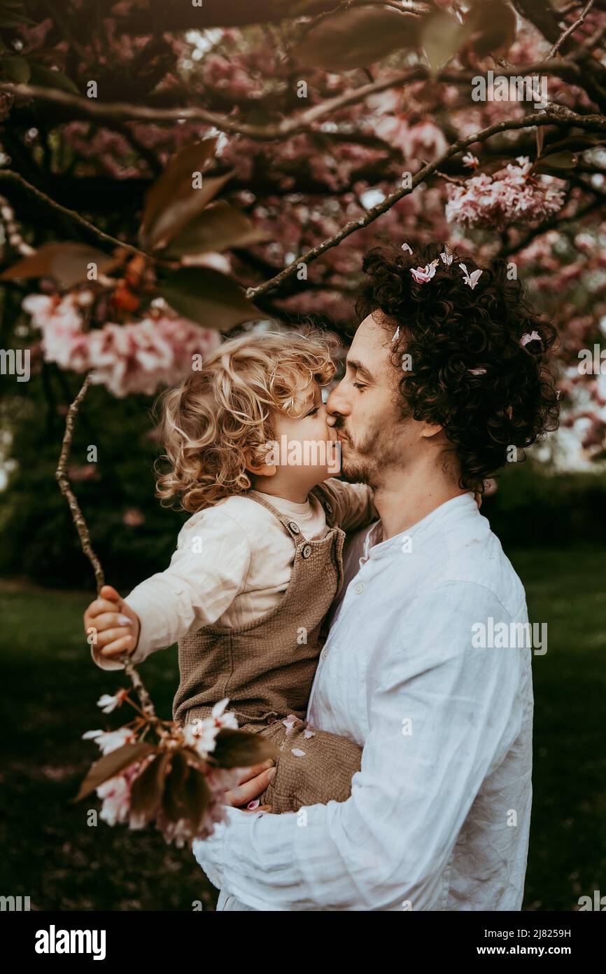 Family blossom photography father and son Stock Photo - Alamy