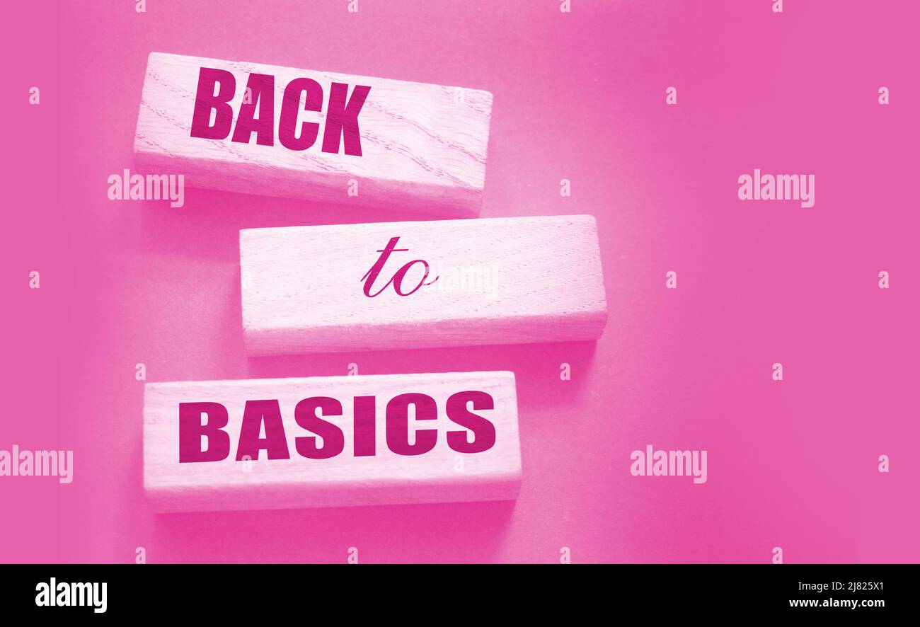 The words back to basics made of letters on wooden blocks. back to ...