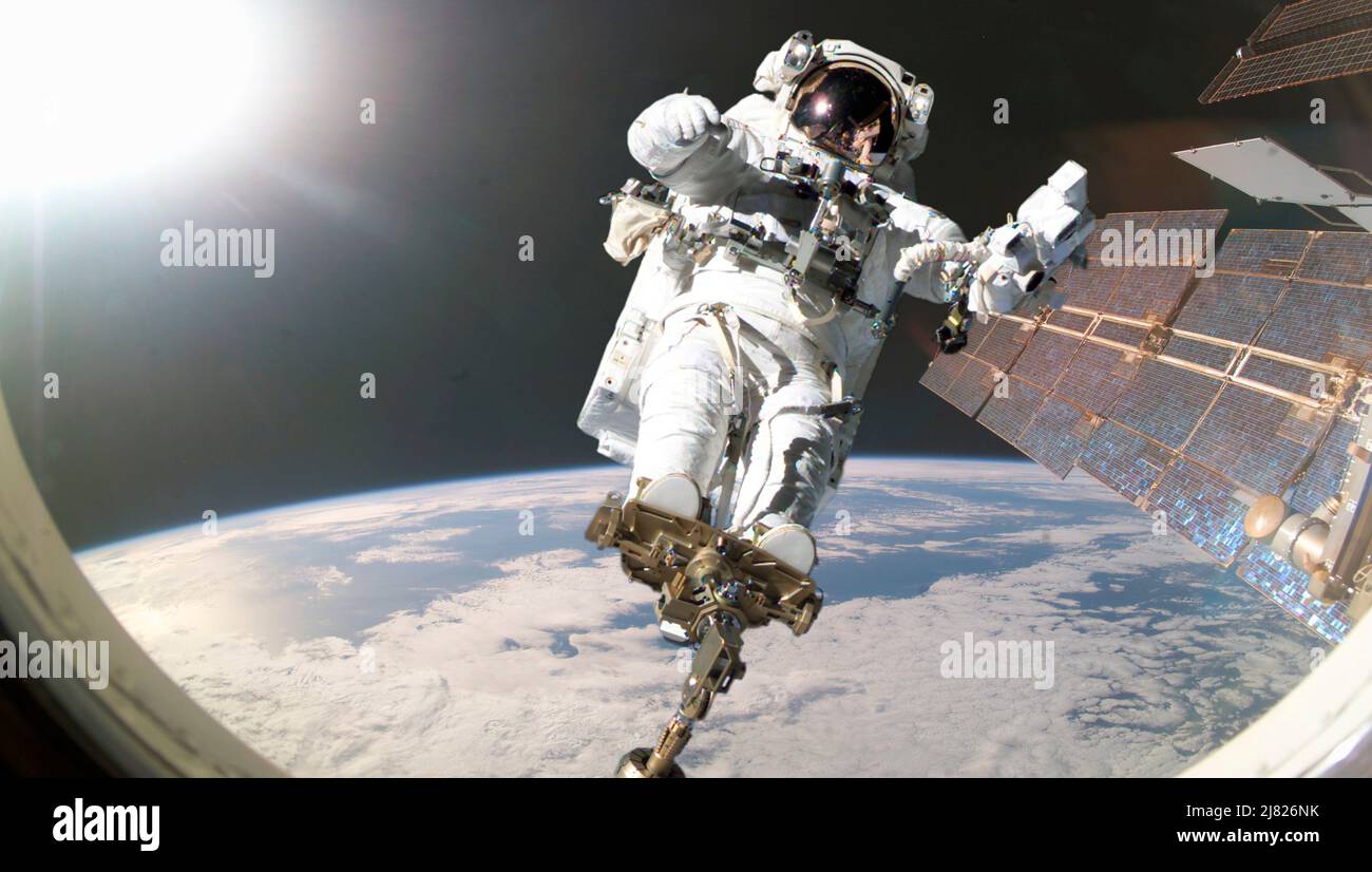 Astronaut in outer space over the planet Earth. Our home. ISS. Elements of this image furnished ...