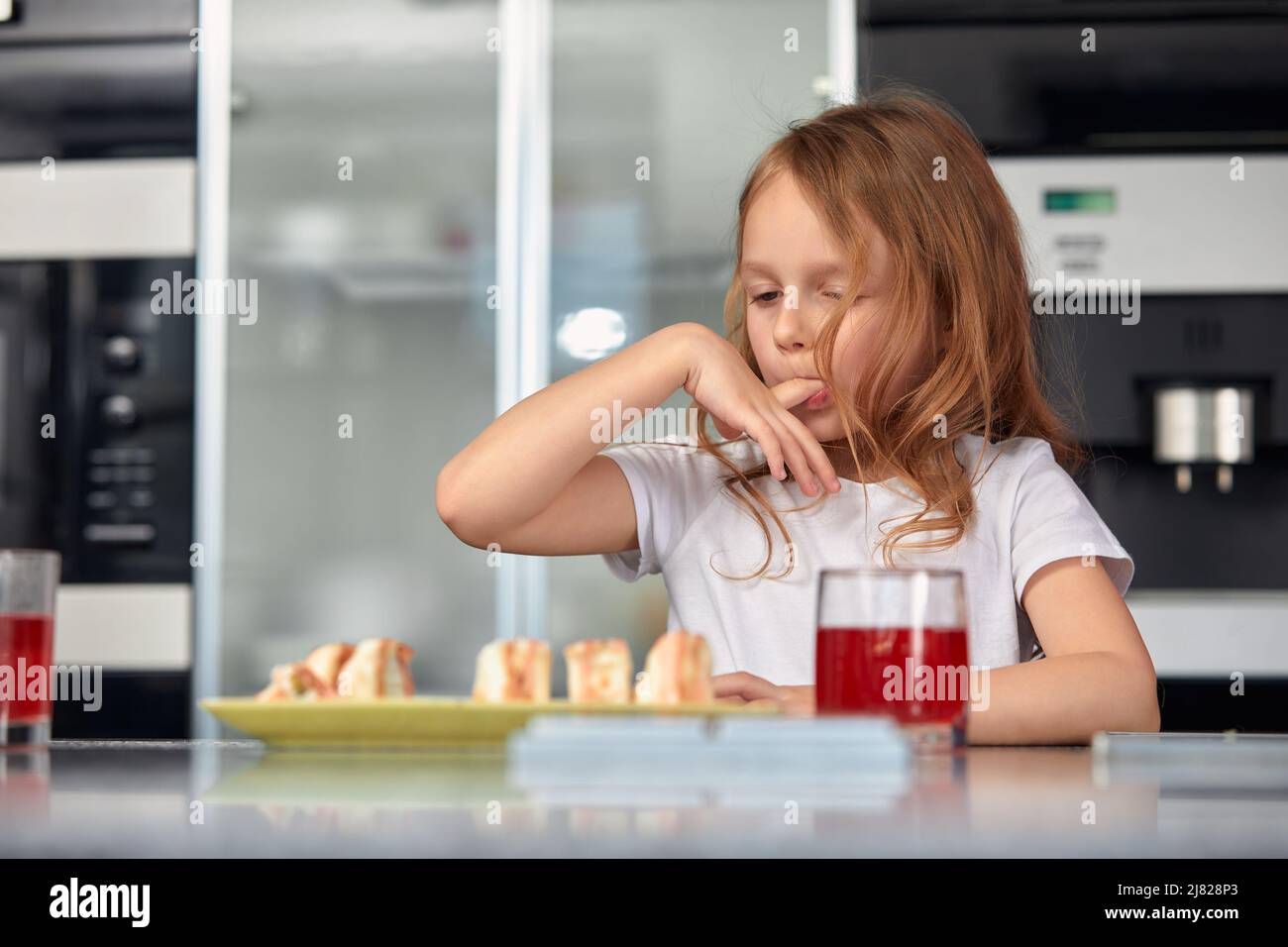 Cute smiling little girl with sushi on white background. Child girl ...