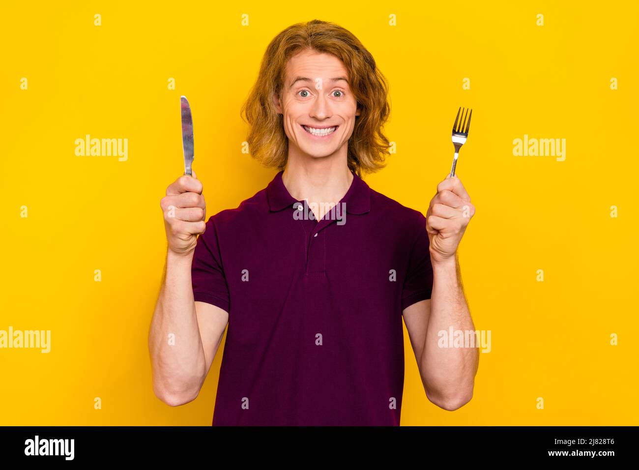 Portrait of funky cheerful person hold spoon fork toothy smile look ...