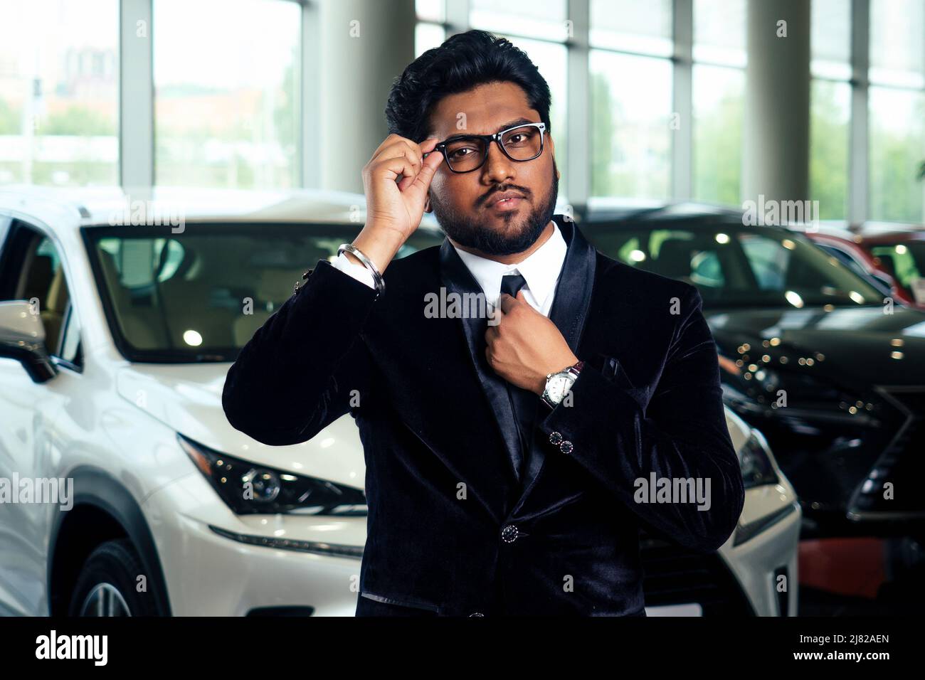 Rich indian businessman in formal wear drive car Stock Photo - Alamy