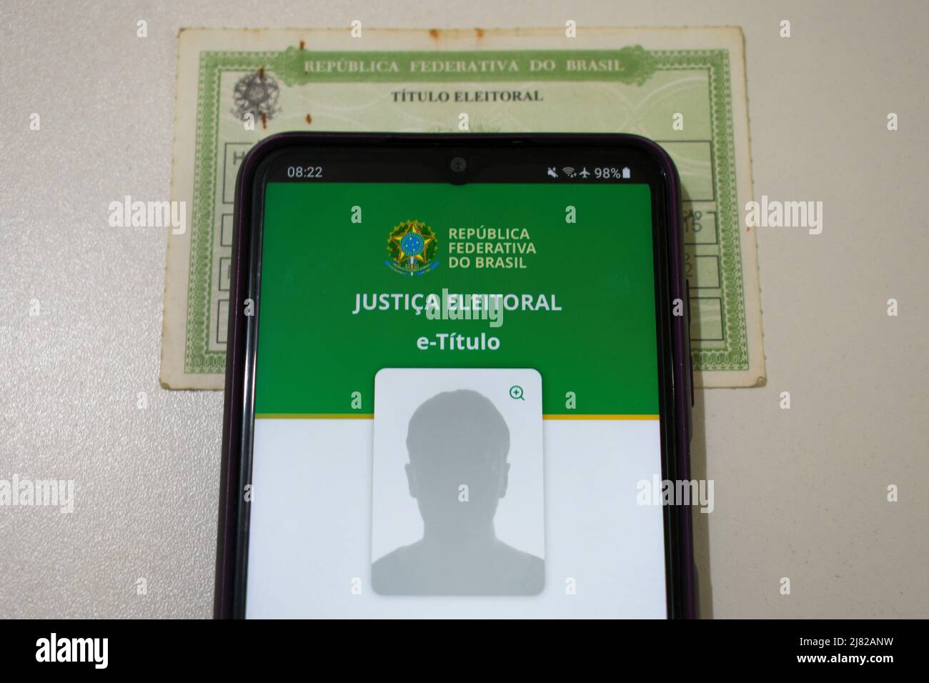 Brazilian digital voter ID card on a smartphone screen, old printed ...