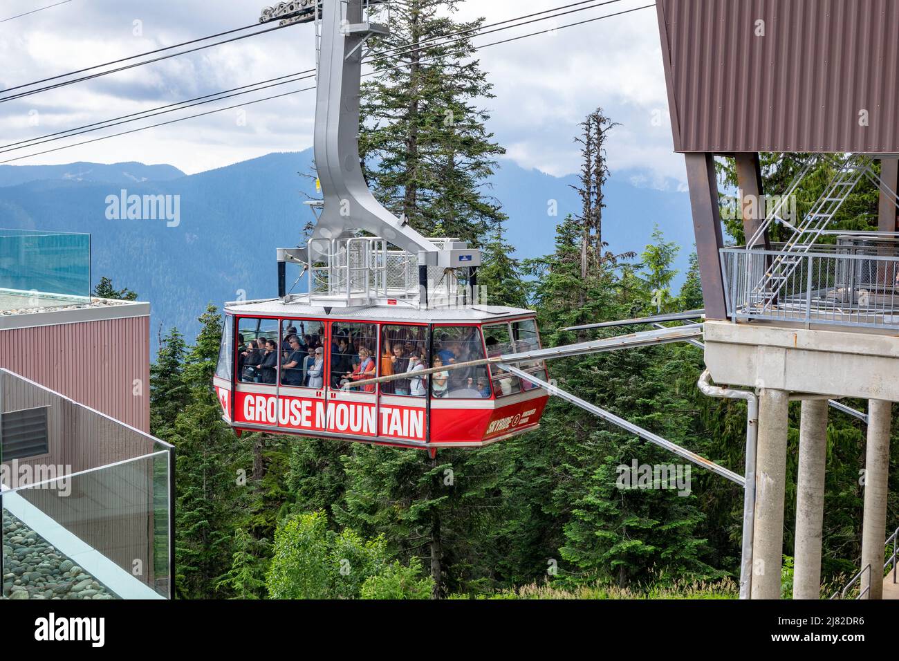 The Grouse Mountain Cable Gondola Arriving At The Summit North ...