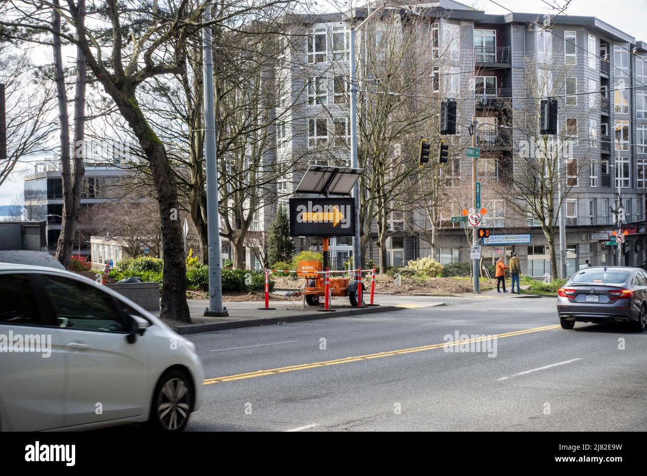 Seattle, WA USA - circa April 2022: Angled view of a road sign pointing ...