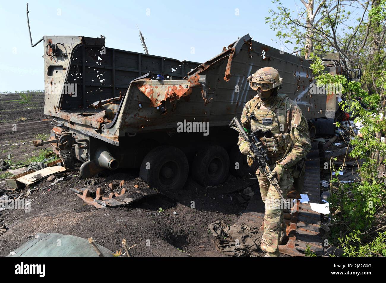 May 8, 2022, Malaya Rohan, Kharkiv, Ukraine: A Ukrainian soldier passes ...
