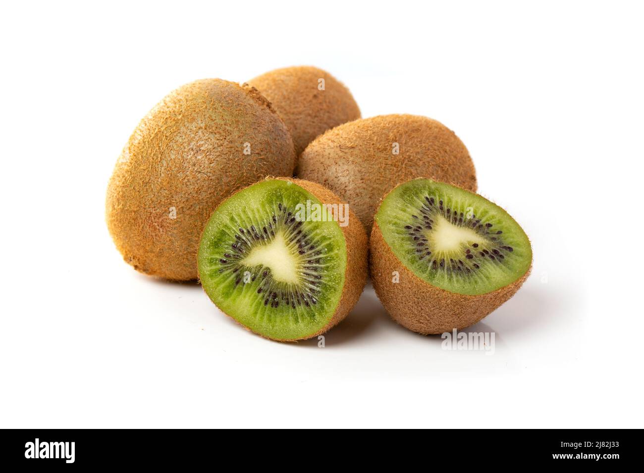 Ripe kiwi fruit and half kiwi isolated on a white background Stock ...