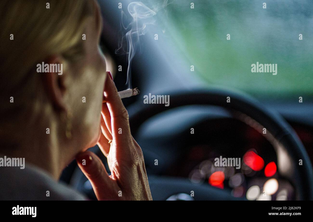 Drag cigarette hi-res stock photography and images - Alamy