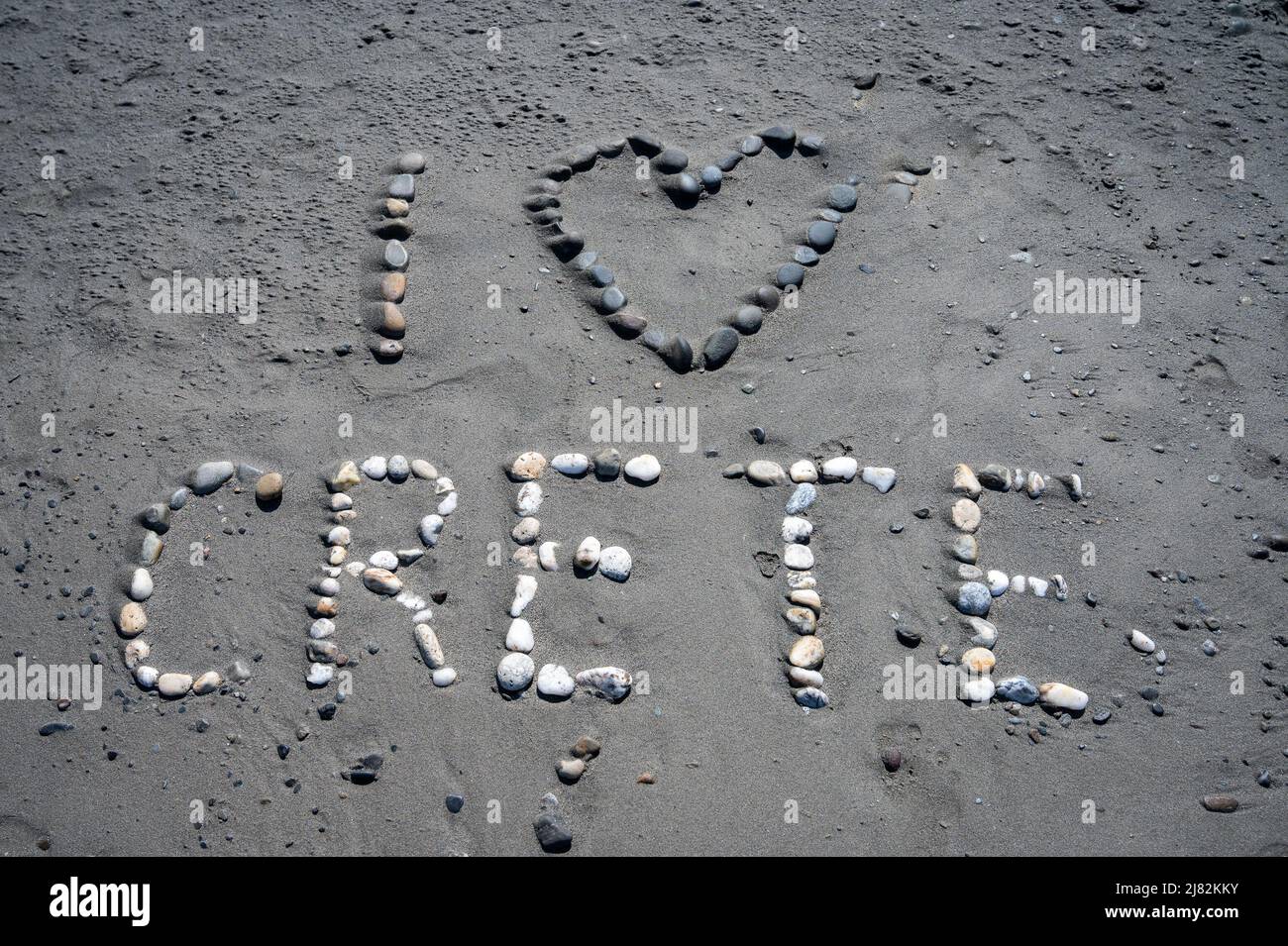 I love Crete written on sandy beach in Crete, Greece. Text I love crete ...