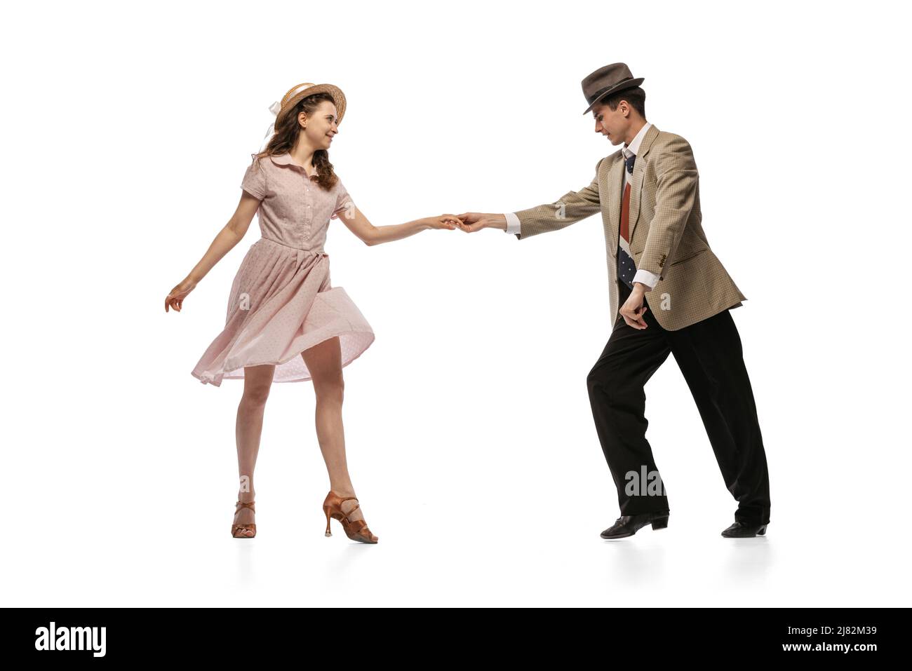 Young Man And Woman In Vintage Retro Style Outfits Dancing Social Dance