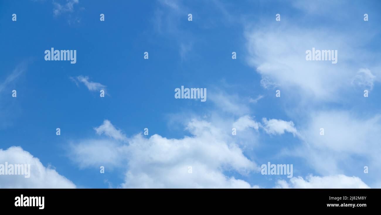 amazing blue background with light clouds Stock Photo - Alamy