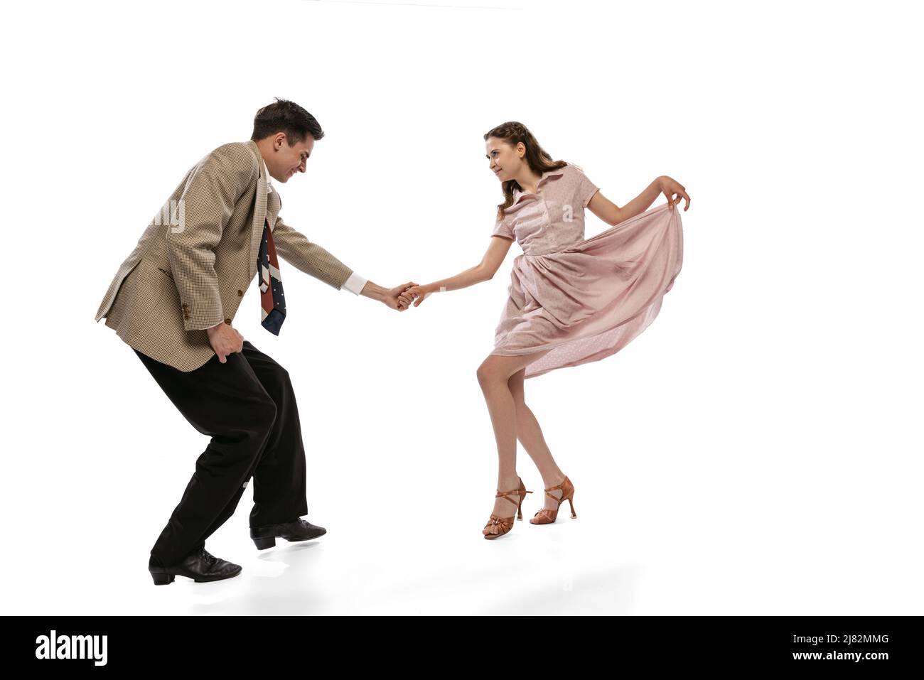 Young Man And Woman In Vintage Retro Style Outfits Dancing Social Dance