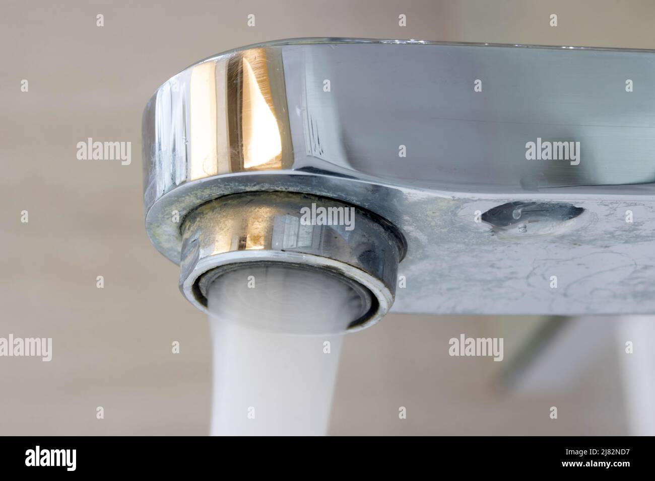 Water flowing from a water tap, macro view Stock Photo - Alamy