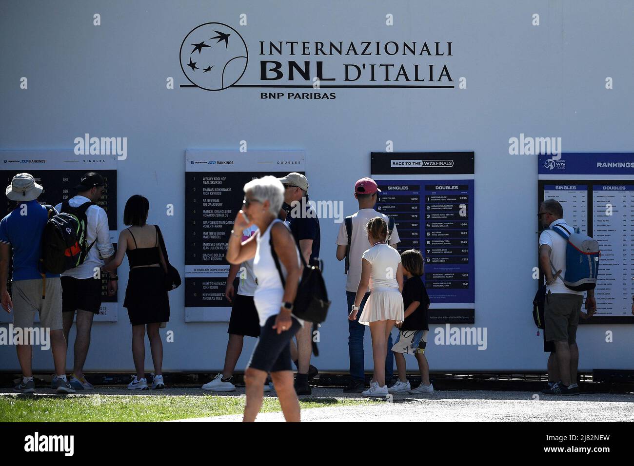 Rome, Italy. 12th May, 2022. People watching WTA matches results and ...