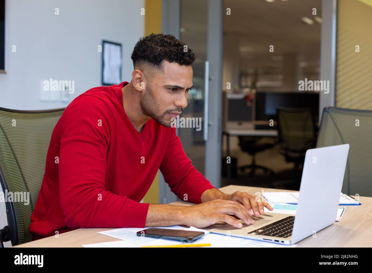 Businessman using computer in modern hi-res stock photography and ...