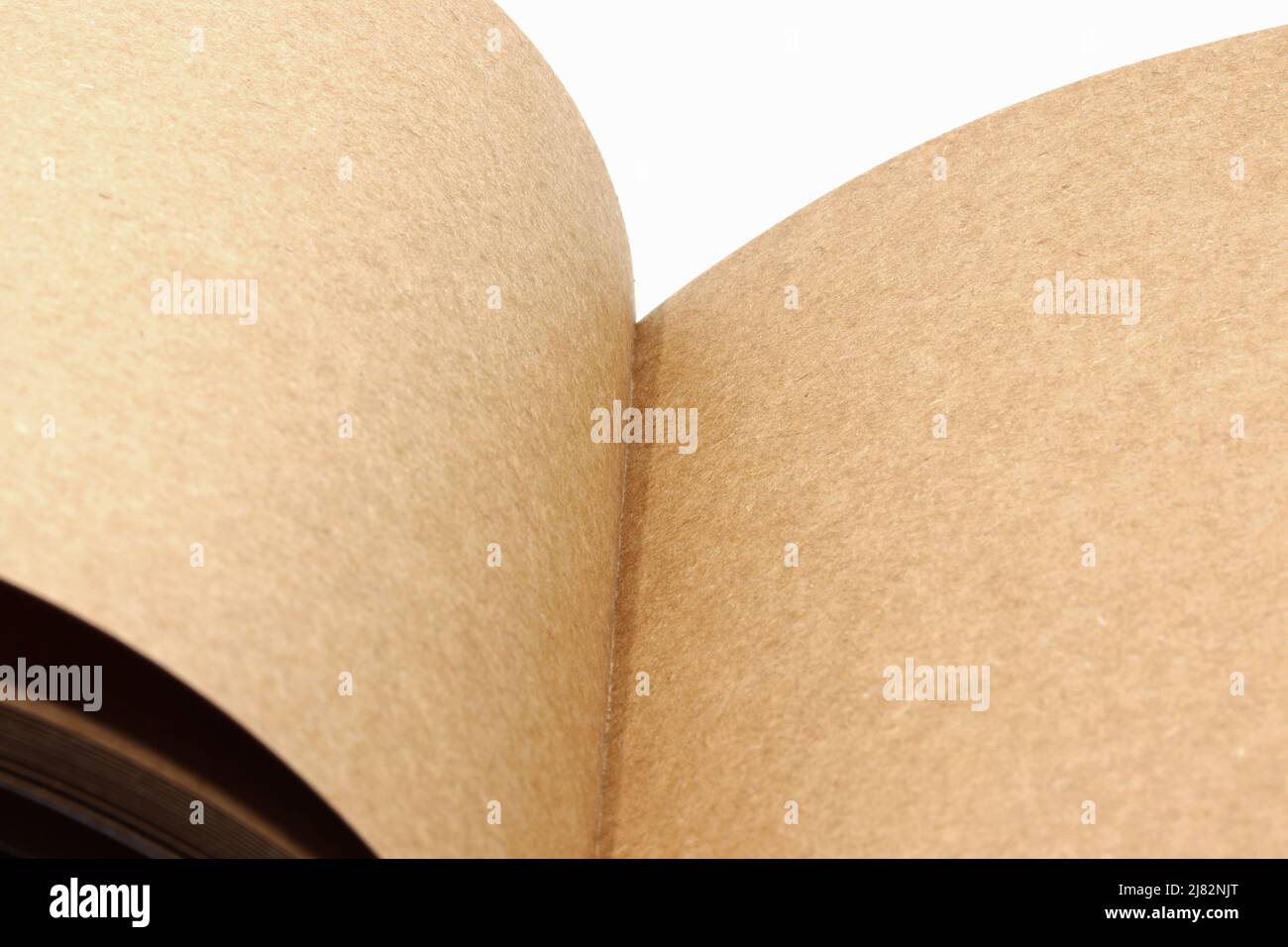 brown opened notebook on isolated white background Stock Photo - Alamy