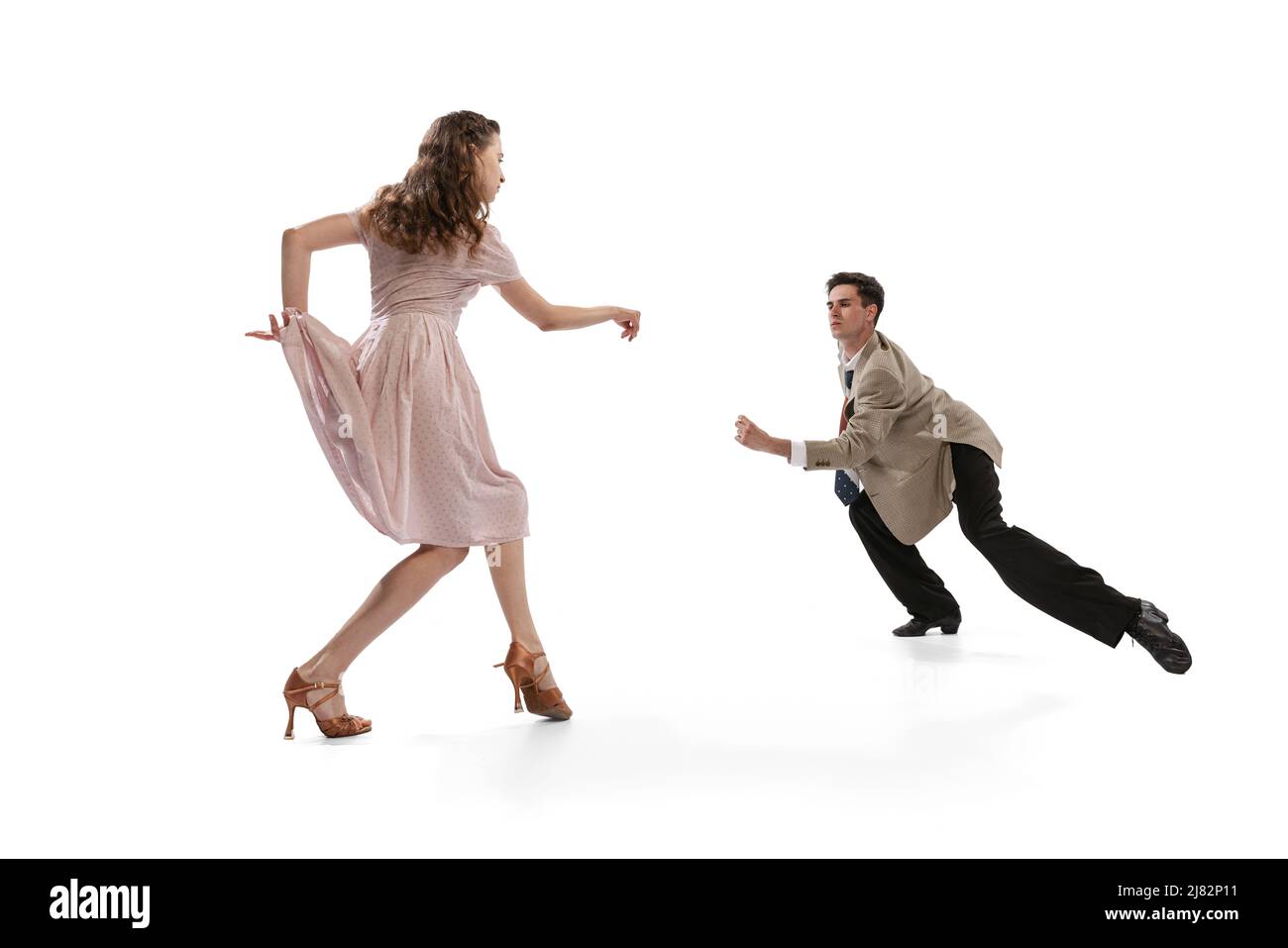 Young Man And Woman In Vintage Retro Style Outfits Dancing Social Dance