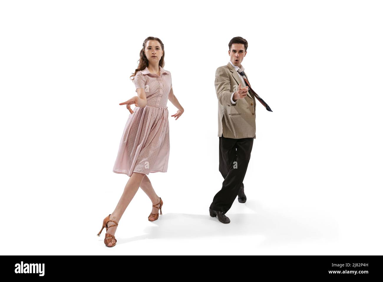 Young Man And Woman In Vintage Retro Style Outfits Dancing Social Dance