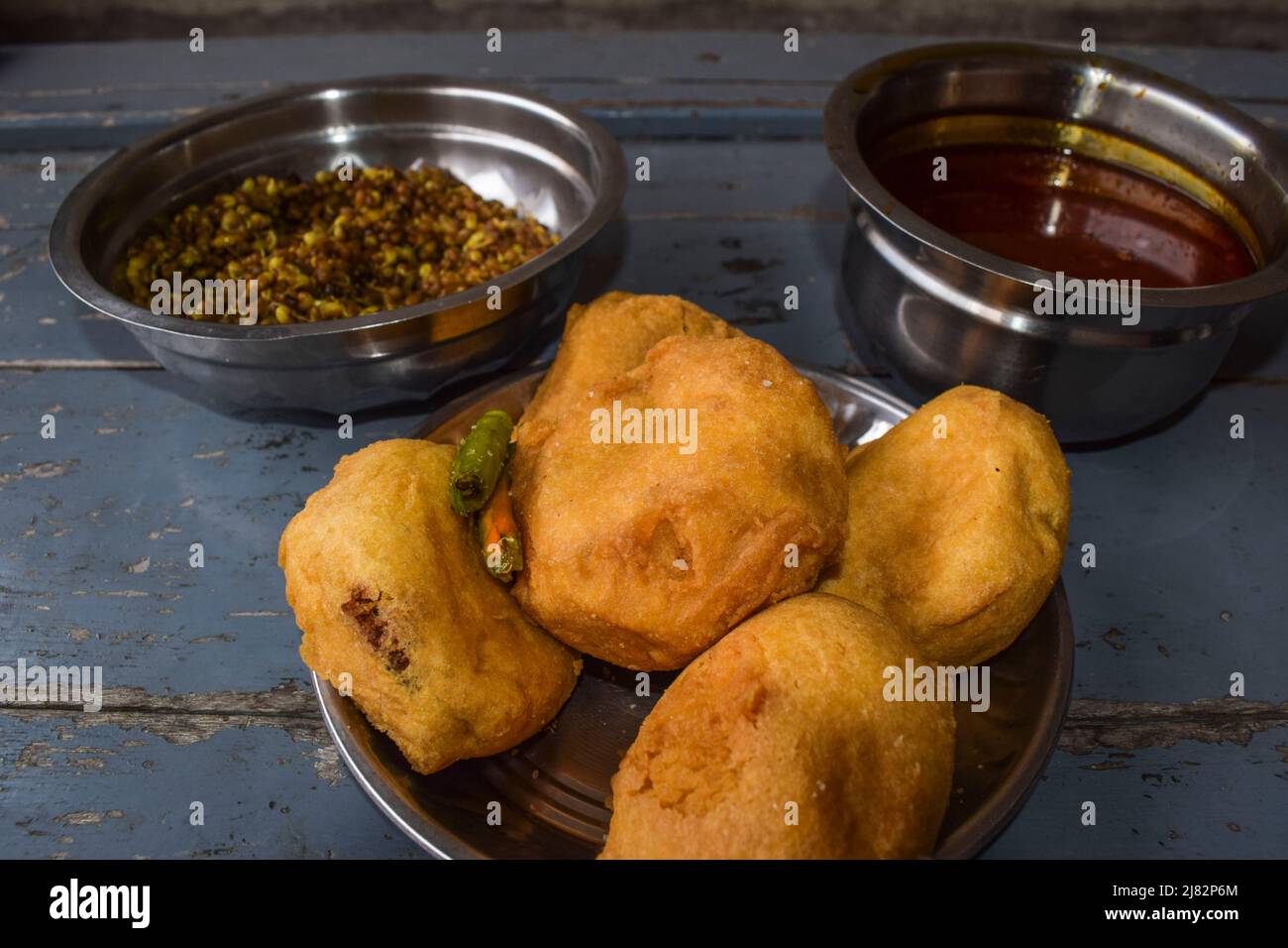 Aloo Batata Vada is Popular Mumbai food, Maharastrian Street food eaten ...