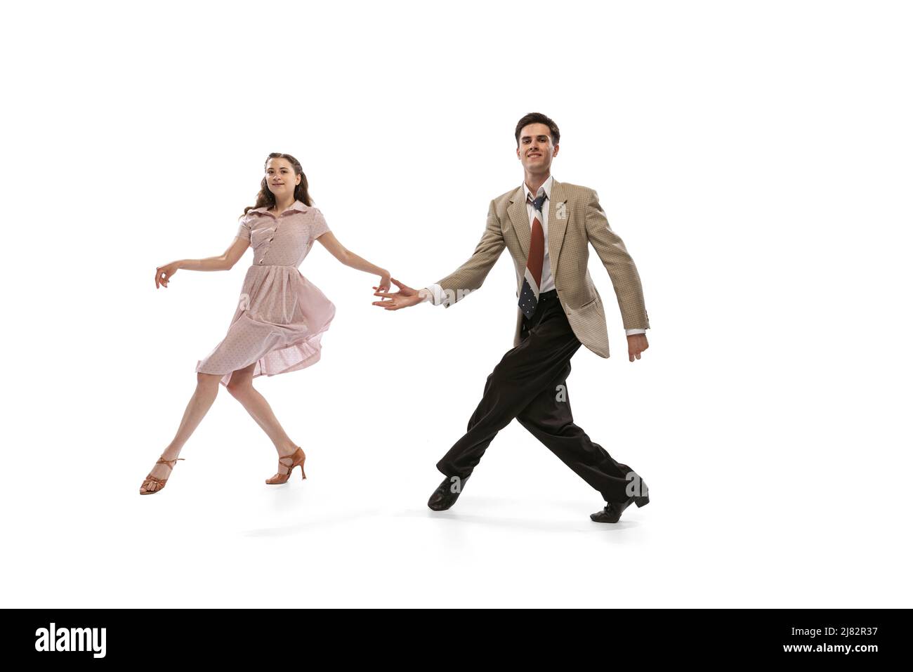 Young Man And Woman In Vintage Retro Style Outfits Dancing Social Dance