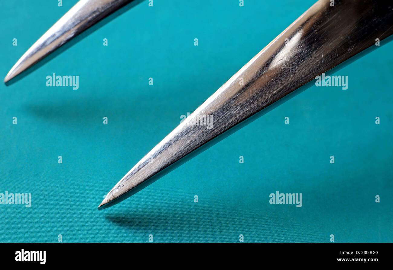 metal fork with reflection on blue background Stock Photo - Alamy