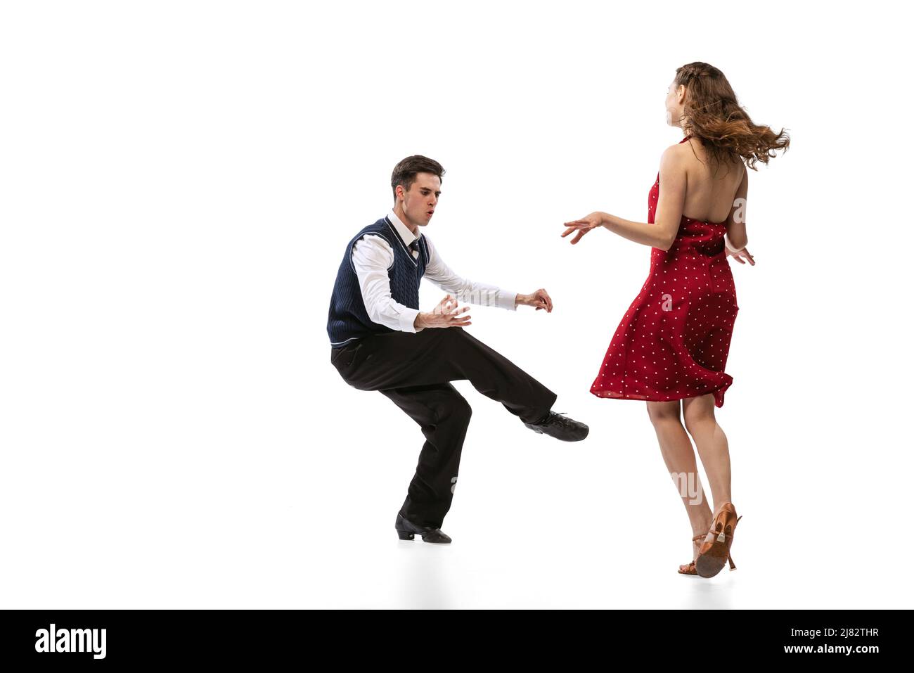 Quickstep. Beautiful girl and stylish man in vintage retro style ...