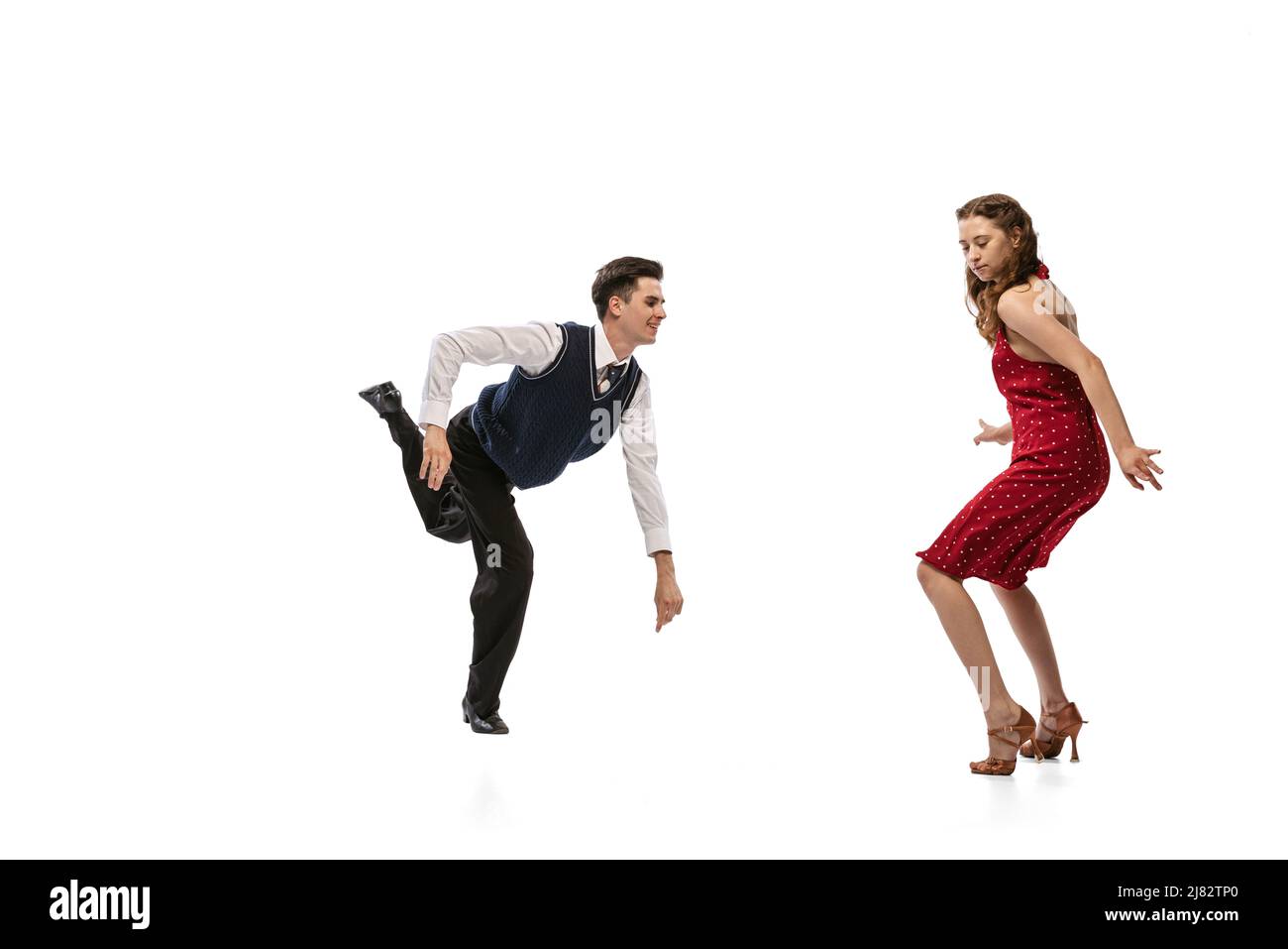 Beautiful girl and stylish man in vintage retro style outfits dancing ...