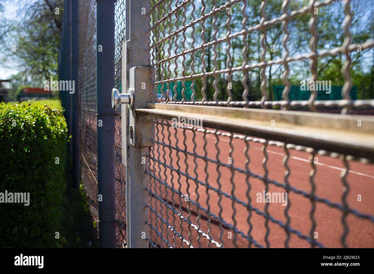 Entrance to the sports ground is fenced with a welded wire fence and a ...