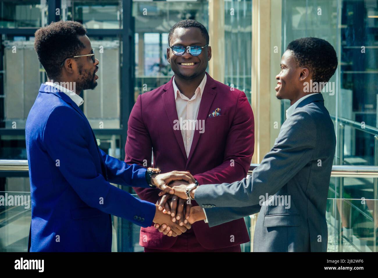 three business people working in conference room Stock Photo - Alamy