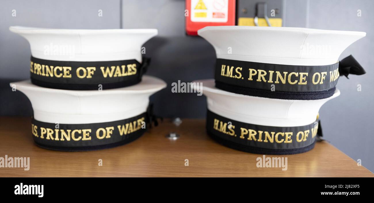 Crew members' caps on the bridge of HMS Prince of Wales at Her Majesty ...