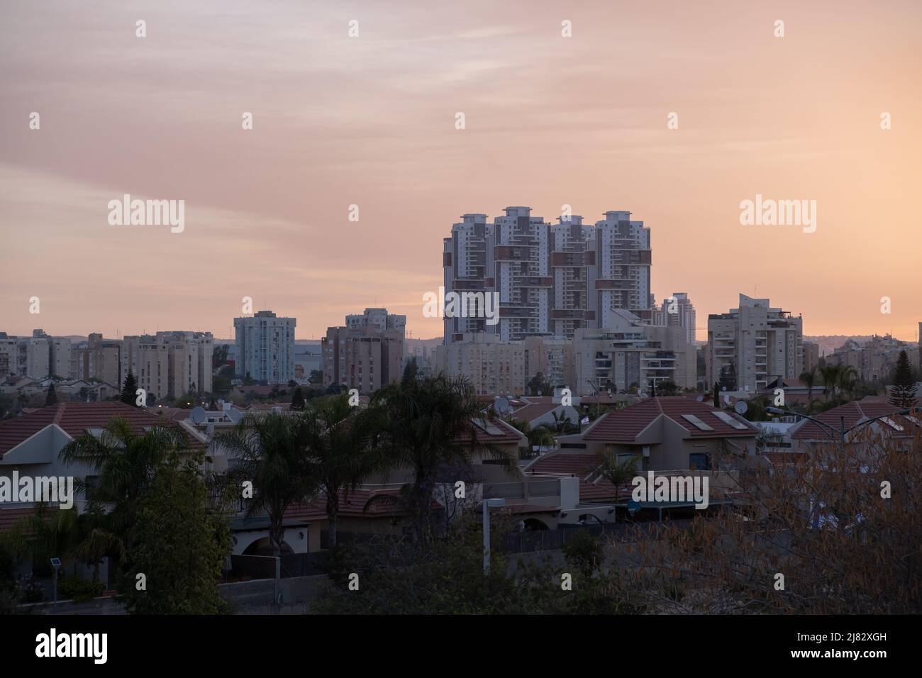 Contrast Architecture at sunrise in the south of Israel, modern towers ...